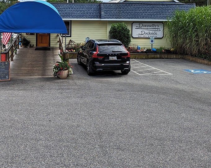 The unassuming yellow exterior with its welcoming blue awning is like that friend who doesn't brag but always delivers an unforgettable meal.