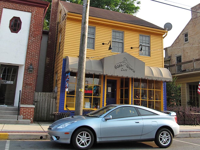 The sunny yellow facade of this Main Street cafe isn't just cheerful—it's practically announcing "good food happens here" to everyone passing by.