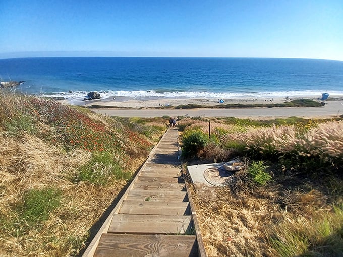 Wooden steps leading to paradise – where every descent brings you closer to that perfect California moment you've been dreaming about all week. 