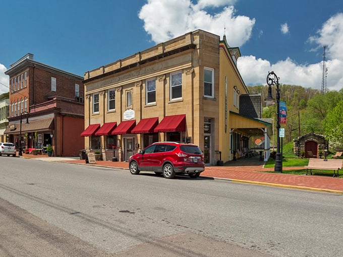 Historic storefronts with bright red awnings – like a Norman Rockwell painting that somehow serves excellent coffee and Wi-Fi.