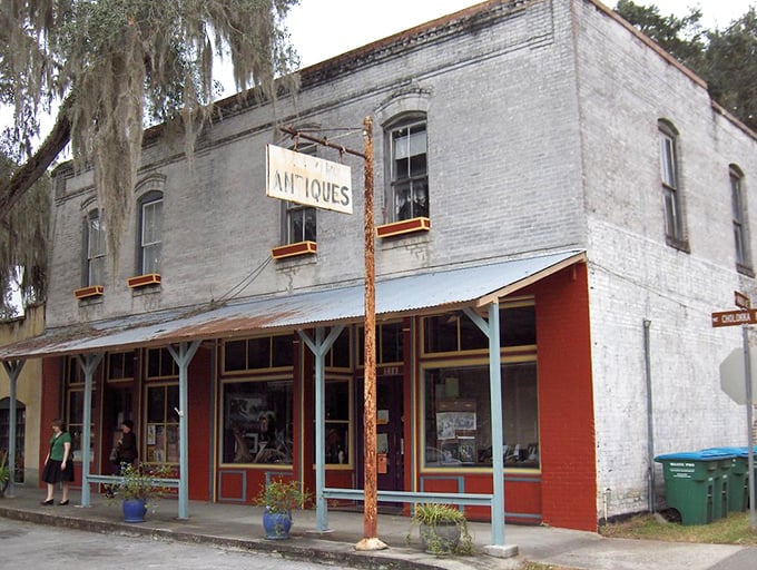 "ANTIQUES" – the sign promises, and the weathered building delivers. This is where family heirlooms and forgotten treasures find new admirers and homes.