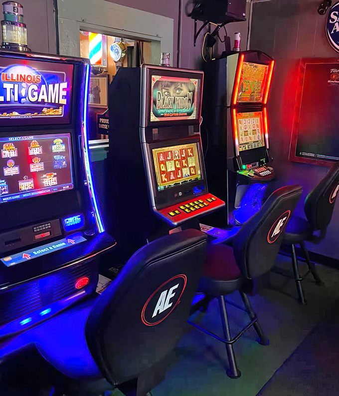 The gaming area glows with electronic promise. In the age of smartphones, there's something wonderfully nostalgic about feeding quarters into machines for entertainment.