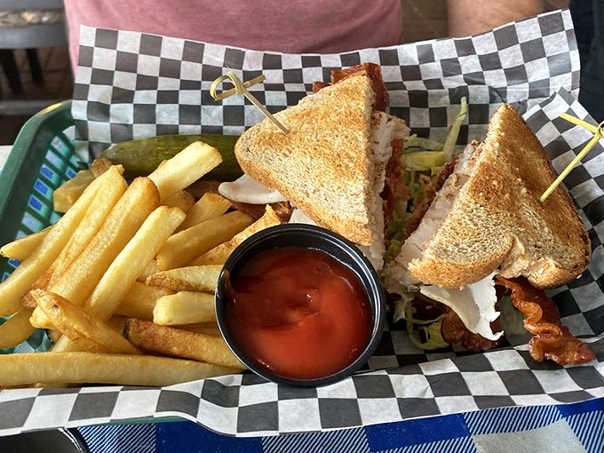 This sandwich isn't just stacked with turkey and bacon; it's engineered for the perfect bite—a masterclass in the architecture of lunch. 