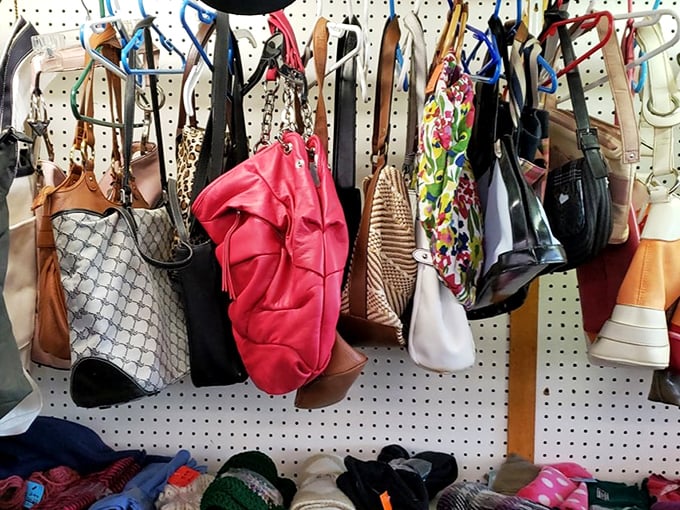 Handbag heaven where designer dreams meet bargain prices. That pink leather number is practically screaming for a night out.