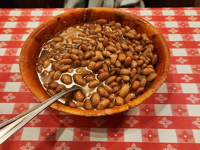 These aren't just beans—they're the supporting actors that deserve their own Oscar, swimming in a broth that's been perfecting its flavor all day.