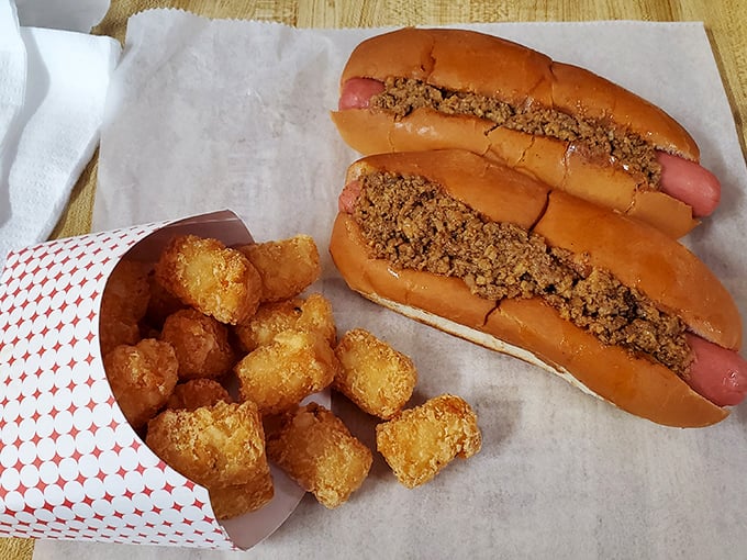 The classic beef hot dog with tater tots – proof that sometimes the simplest pleasures are the most profound. Childhood nostalgia never tasted so good.