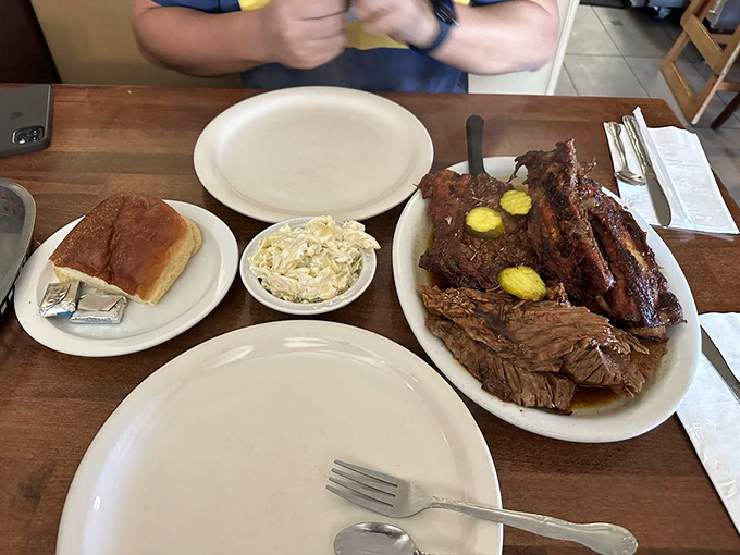 The feast before you represents hours of patient smoking and decades of perfected technique in every bite.
