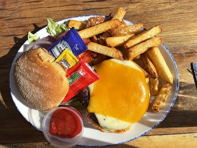 A burger that proves The Cove isn't just about seafood. That melted cheese is performing a slow, mesmerizing dance that hypnotizes hungry diners.