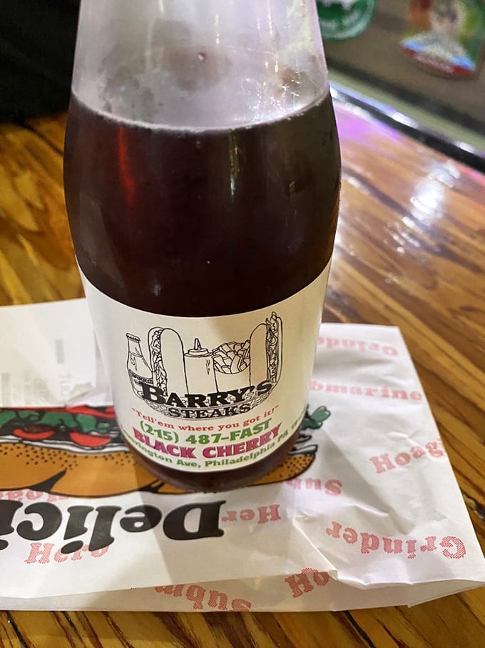 Black cherry soda in a glass bottle—the kind of nostalgic beverage that makes everything taste better. Philly sandwich culture in liquid form.