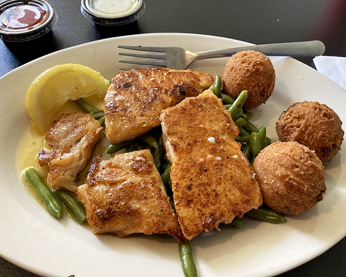 Blackened grouper that's somehow both delicate and bold, like that friend who's quiet until they start telling the best stories.