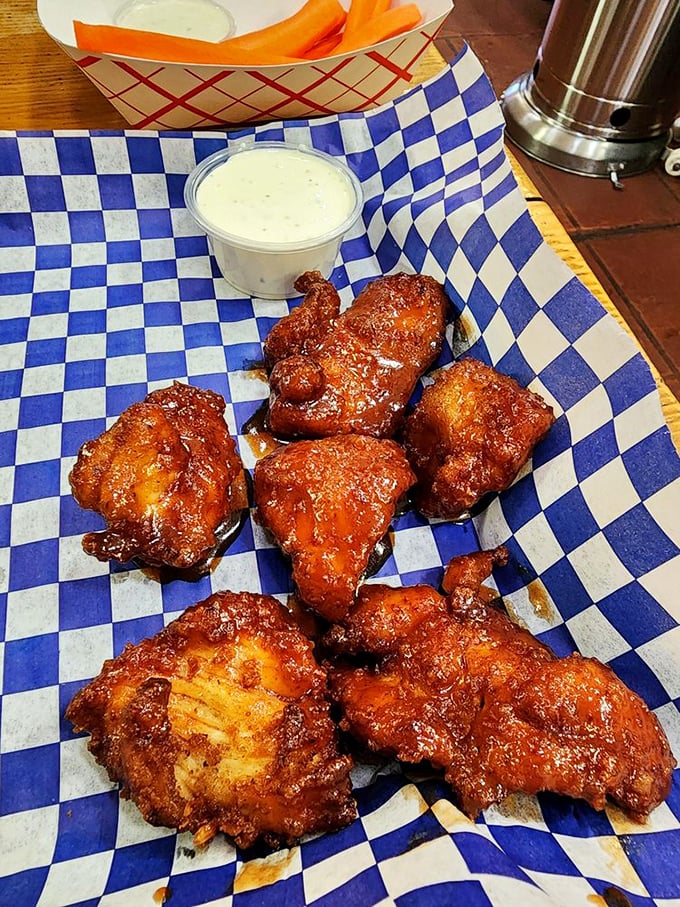 These aren't just chicken wings—they're flavor grenades, each one coated in sauce that strikes the perfect balance between sweet, tangy, and "can I lick my fingers in public?"
