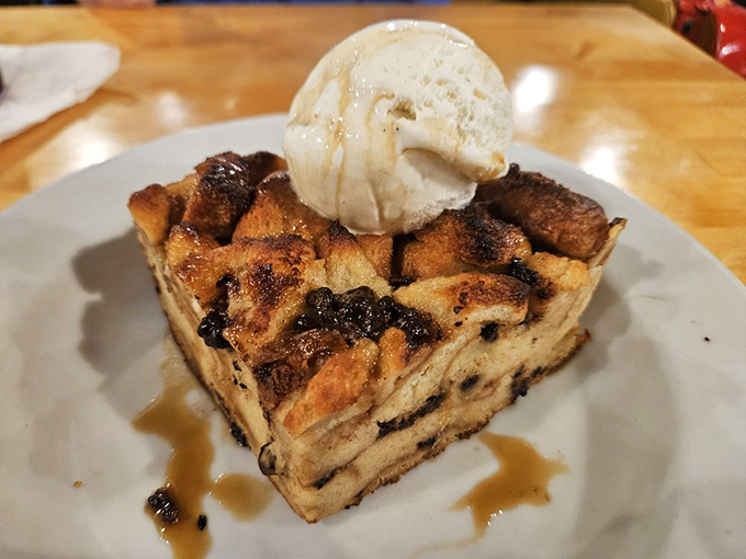 Bread pudding that's had a close encounter with caramel sauce and ice cream—comfort food that's dressed up for a night on the town.