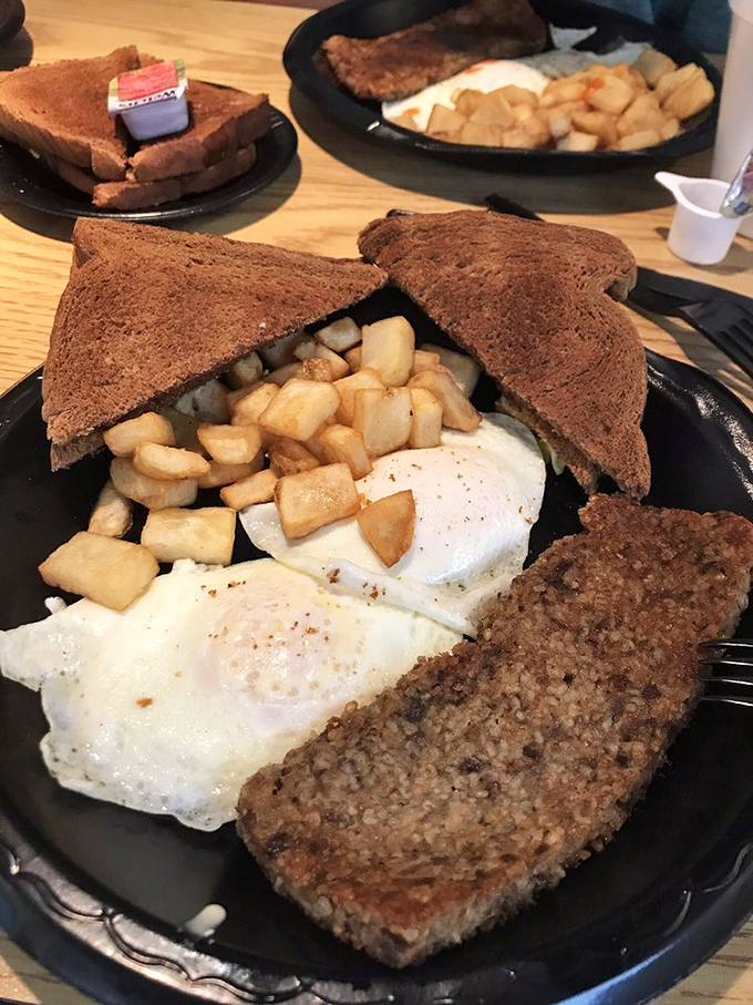 Breakfast doesn't get more honest than this. Eggs, potatoes, and meat on a no-nonsense plate – the morning equivalent of a firm handshake. 