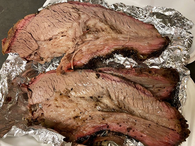 Brisket with that telltale pink smoke ring is barbecue's equivalent of Olympic gold—hours of patience transformed into meat that barely needs chewing.