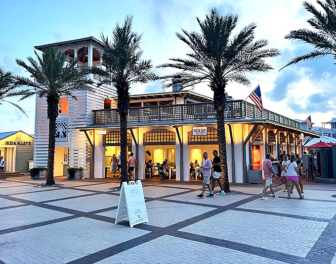 Bud & Alley's glows with golden hour promise—where dinner reservations are as valuable as beachfront property. The food tastes even better than the view.