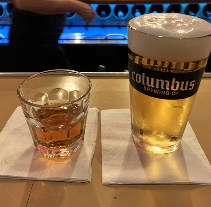 Buffalo Trace and a Columbus brew—because great barbecue deserves proper liquid accompaniment. The perfect Ohio handshake.