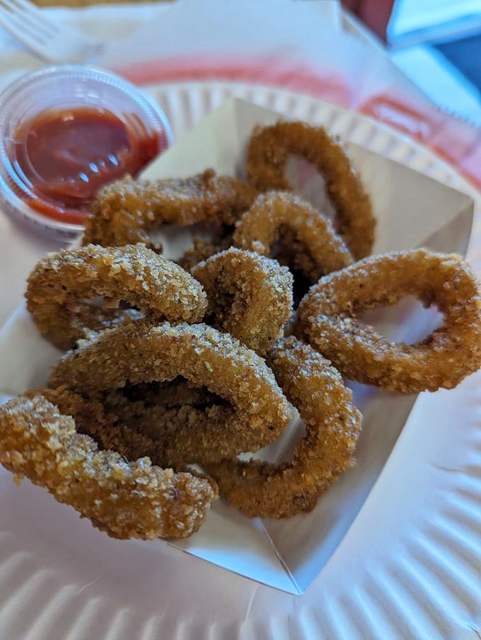 Calamari rings that don't require the chewiness workout most places offer—just tender seafood in a crisp, golden jacket.