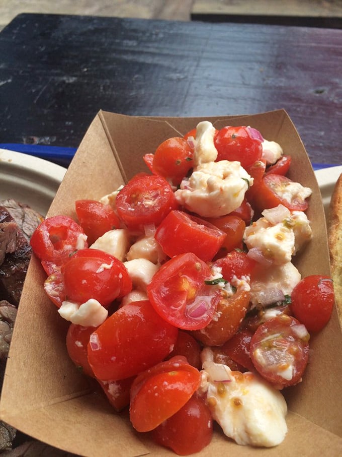 Fresh tomatoes and mozzarella—the palate cleanser you didn't know you needed at a barbecue joint. Bright flavors that dance.