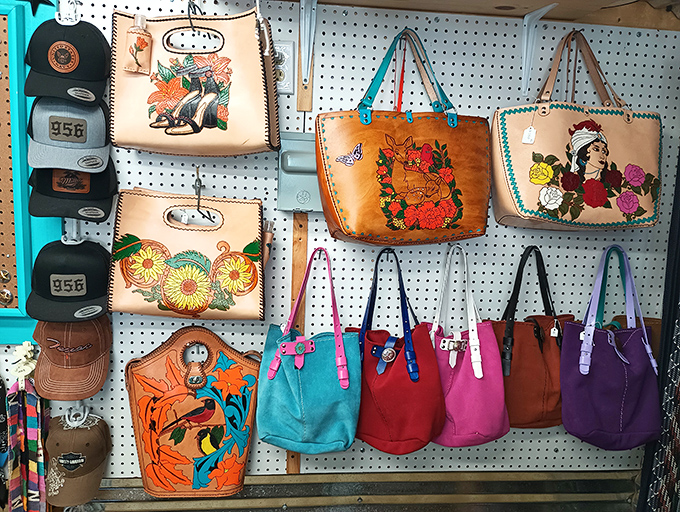 Leather bags blooming with vibrant embroidery—portable art pieces that carry your essentials while announcing "boring accessories aren't my style."