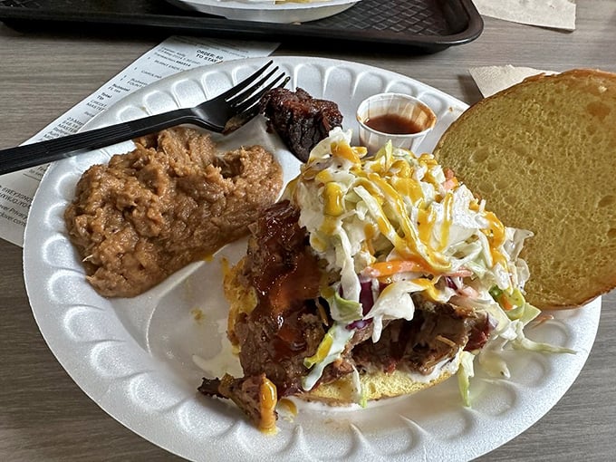 When your sandwich requires structural engineering and comes with a side of slaw that's dressed better than most people at the mall.