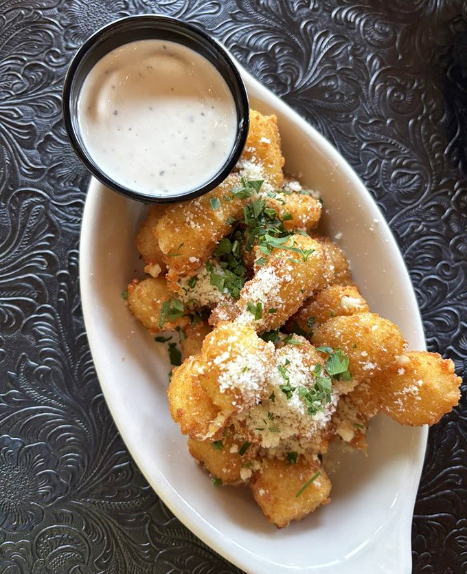 Cheese curds dusted with parmesan and herbs—because Wisconsin knows the only thing better than cheese is more cheese with a side of ranch.