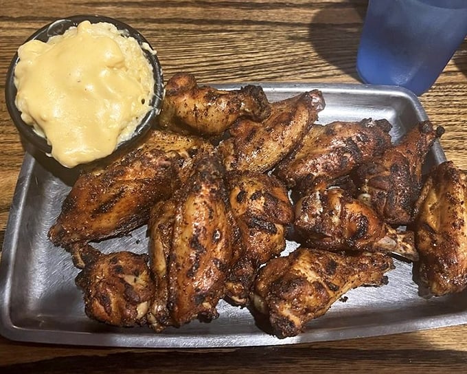 These wings have clearly been introduced to heat in all the right ways—crispy, spice-crusted, and served with a side of creamy relief.