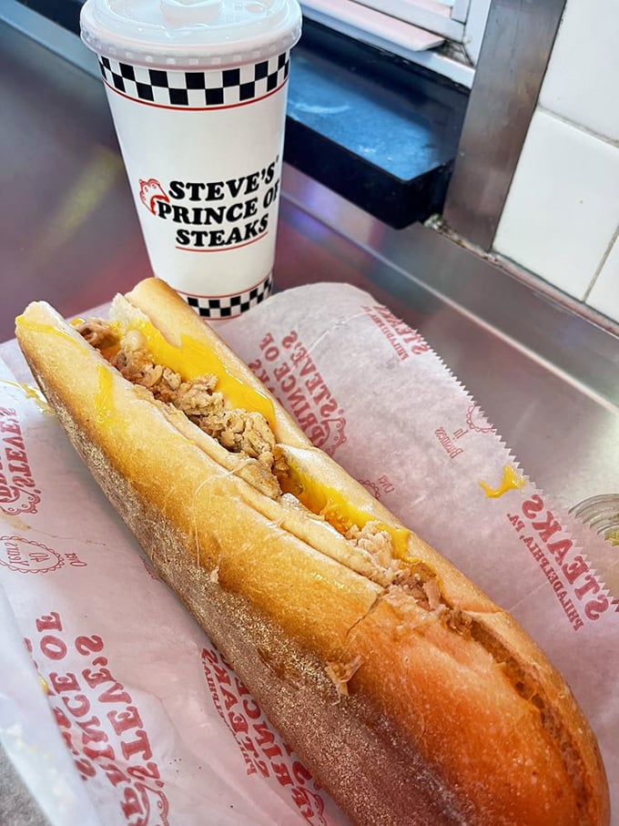 The chicken cheesesteak with its golden cheese lava flow proves that beef isn't the only path to sandwich enlightenment.