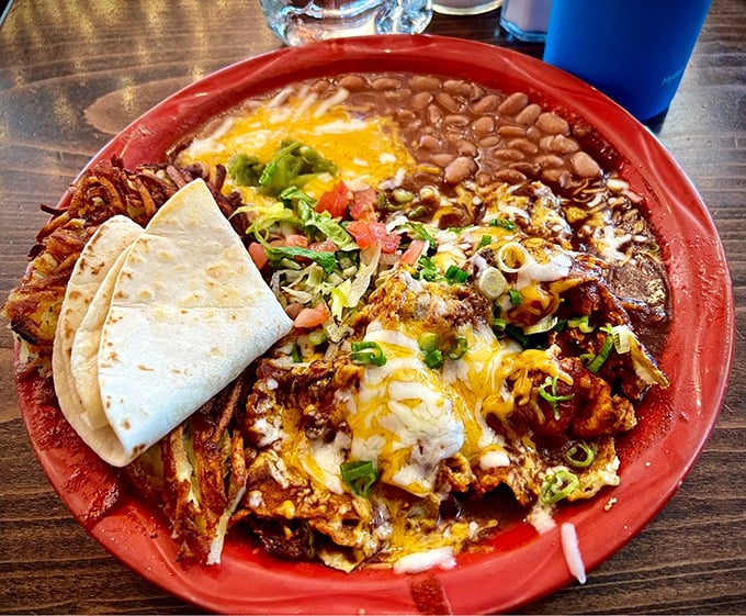 Chilaquiles swimming in that famous green chili sauce – comfort food that hugs you from the inside. 
