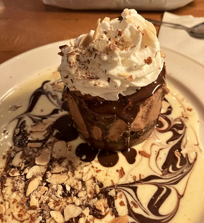 The Chocolate Island dessert doesn't just end your meal—it throws a party for your taste buds with chocolate, whipped cream, and artistic drizzles worthy of a museum.