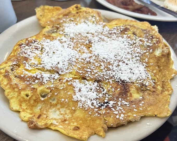 French toast that's had a cinnamon roll identity crisis, resulting in a breakfast masterpiece that makes ordinary French toast hang its head in shame.