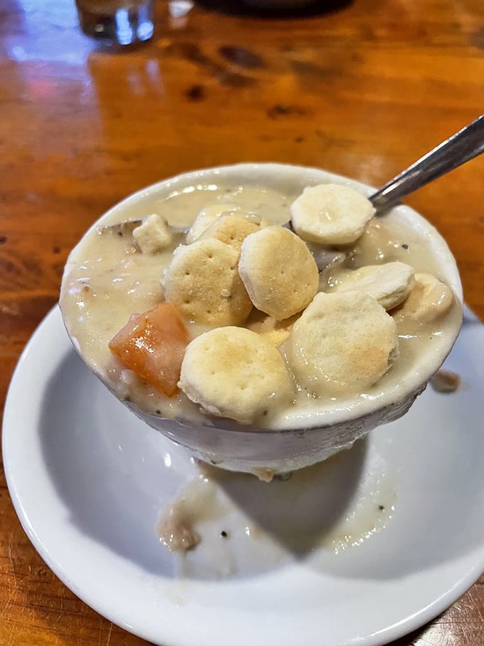 Clam chowder so hearty it could qualify as a main course. Those oyster crackers aren't floating—they're crowd-surfing on deliciousness.
