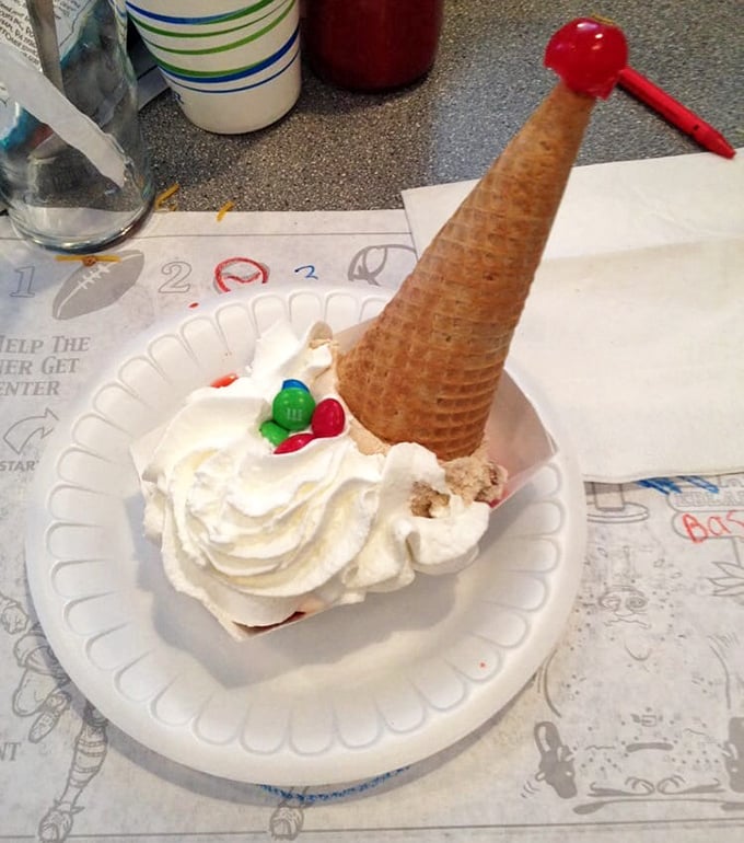 Ice cream architecture at its finest. That waffle cone hat isn't just dessert—it's wearing your sweet tooth on your sleeve, especially when it's crowned on a whimsical clown sundae.