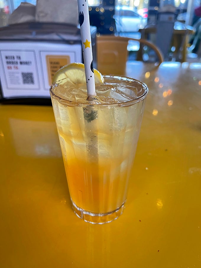 Sunshine in a glass with a paper straw. This refreshing lemonade provides the perfect counterpoint to rich, savory chicken – nature's perfect palate cleanser.
