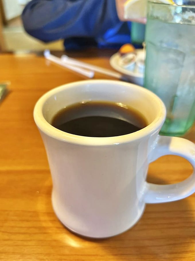 The humble diner mug – holding liquid ambition that fuels road trips, conversations, and the American dream, one sip at a time.