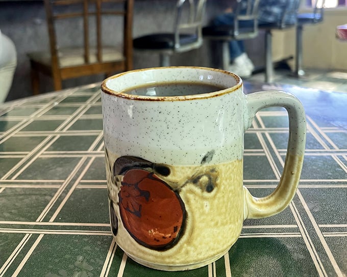 This isn't just coffee—it's morning salvation in ceramic form. The mug alone has probably heard more Tucson secrets than a bartender.