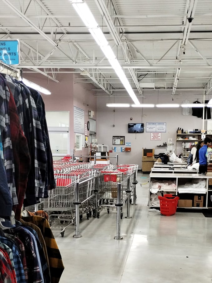 The checkout area—where the magic moment happens as your mountain of finds rings up for less than the cost of a fancy dinner.