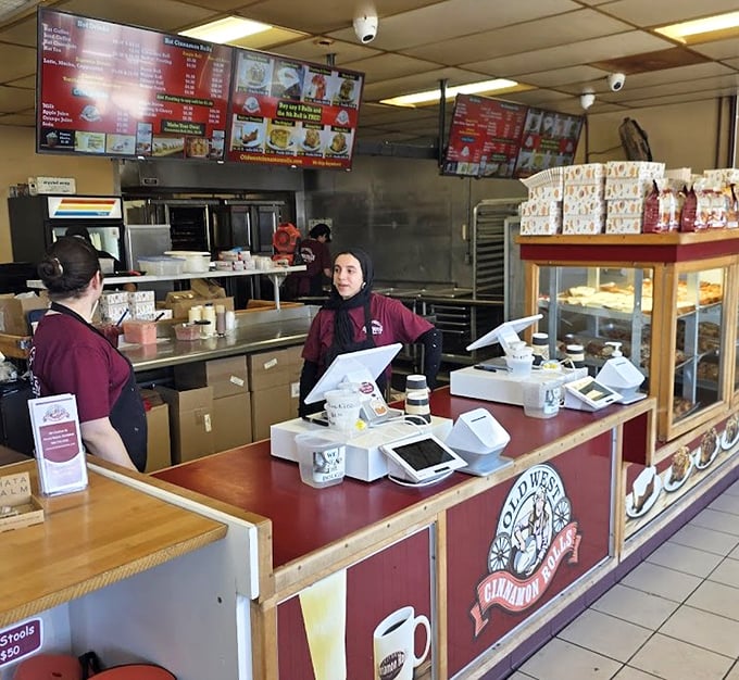 Command central for cinnamon roll operations. The counter where dreams are packaged and handed over with a smile.