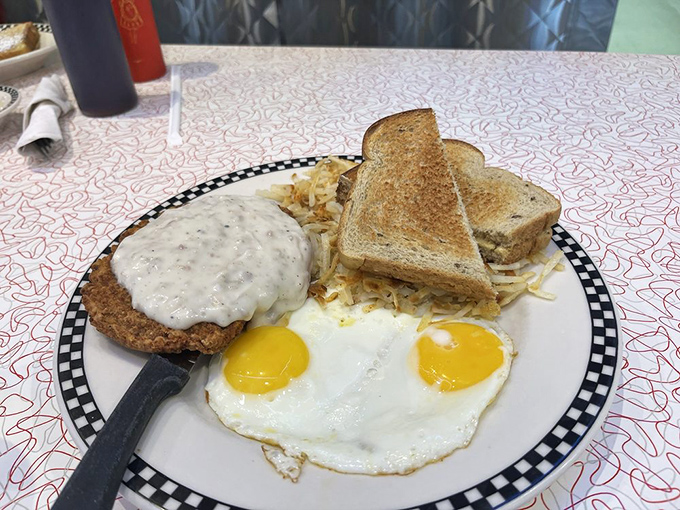 Country fried steak with eggs sunny-side up—because sometimes you need a breakfast that says, "Go ahead, conquer the day. I've got you covered."