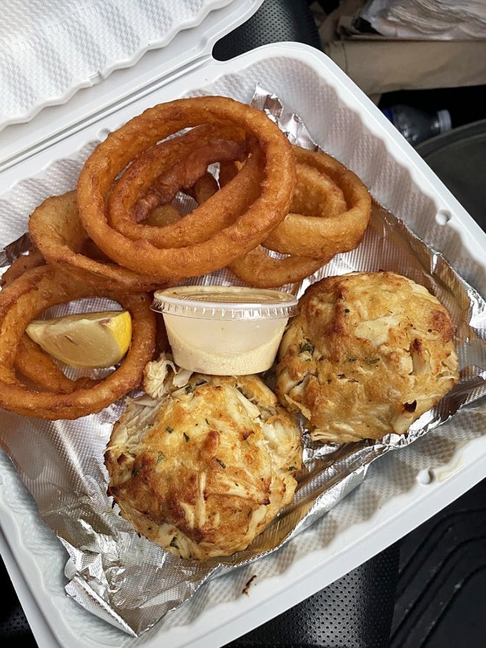 That crab cake and onion ring combo is what happens when Maryland meets the county fair – pure delicious democracy.