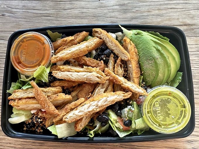 Not all heroes wear capes—some come topped with grilled chicken and avocado on a bed of greens.