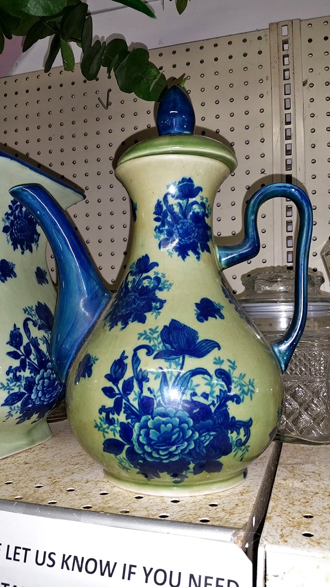 Blue and cream perfection! This teapot doesn't just hold liquid—it holds stories of afternoon gatherings and conversations long since evaporated.