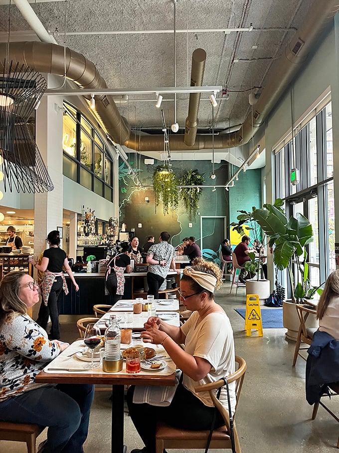 Where food becomes the centerpiece of human connection. Notice how everyone's attention is divided between their plates and their companions—as it should be.