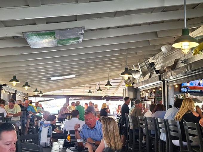 Happy diners in their natural habitat – surrounded by seafood and zero regrets about that third appetizer.