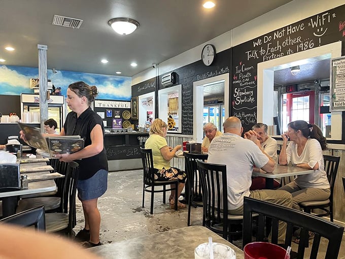 Happy diners proving that good food is the universal language – no translation needed when forks are this busy.