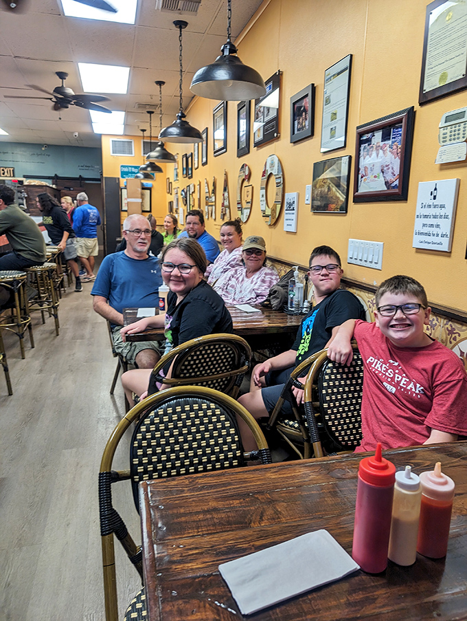 Happy diners experiencing what food writers dream about: authentic cuisine that creates memories stronger than any souvenir could.