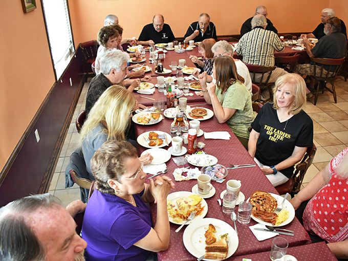 The true heart of any great diner: people coming together, proving that good food creates community faster than any social media platform.