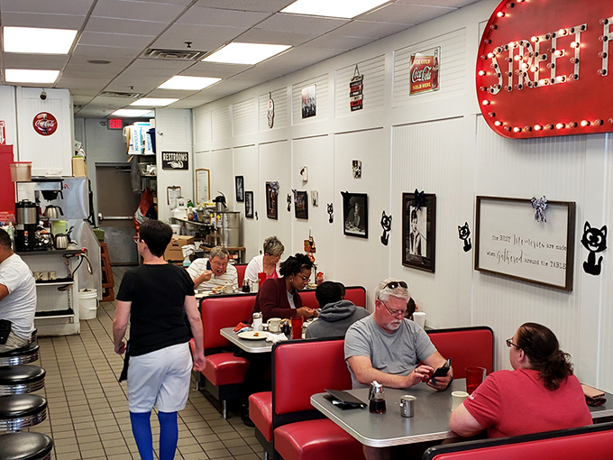Where conversations happen over coffee refills and maple syrup. These booths have heard decades of morning chatter and vacation plans.