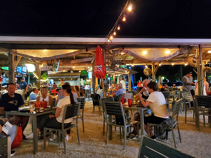 The outdoor seating area fills with a mix of sunburned tourists and knowing locals—all united in the pursuit of good food and good times.