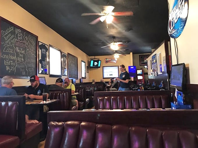 The dining area buzzes with conversation and laughter – the soundtrack to any great local gathering spot worth its salt.