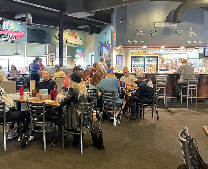 Where locals gather to worship at the altar of seafood. The packed tables tell you everything you need to know.